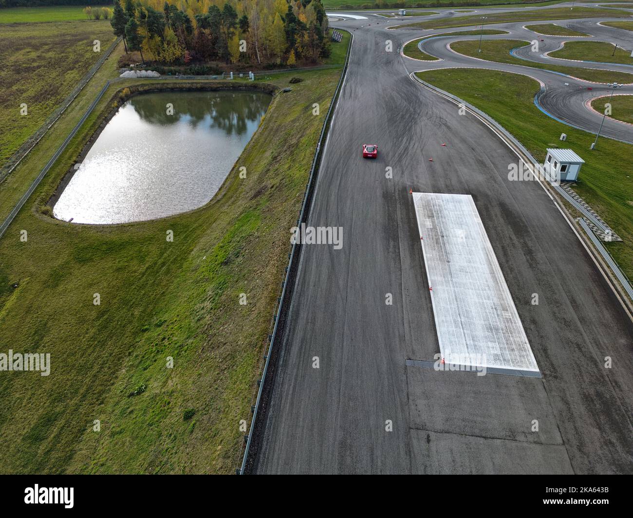 luxury cars racing track. Aerial photograph from drone Stock Photo - Alamy