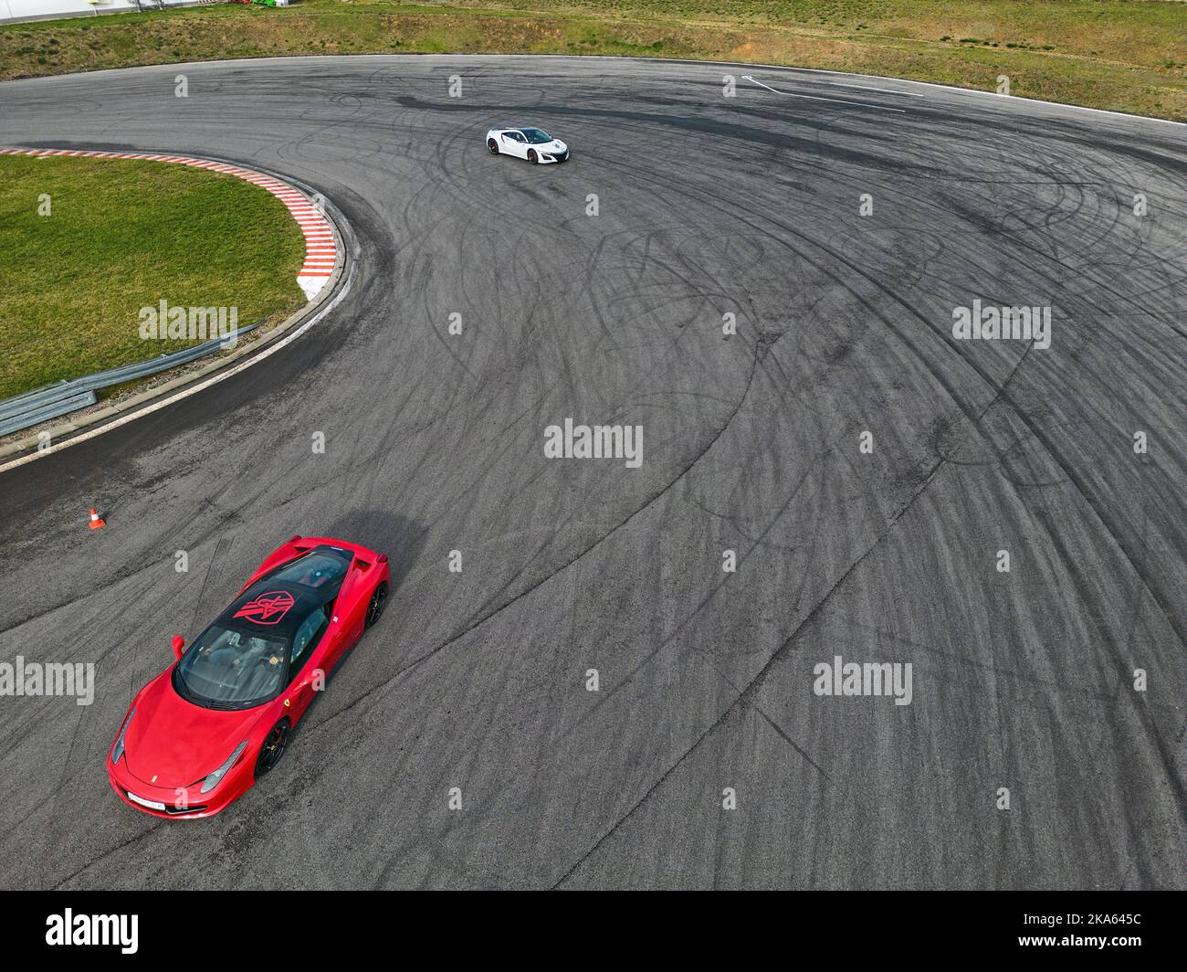 luxury cars racing track. Aerial photograph from drone Stock Photo - Alamy