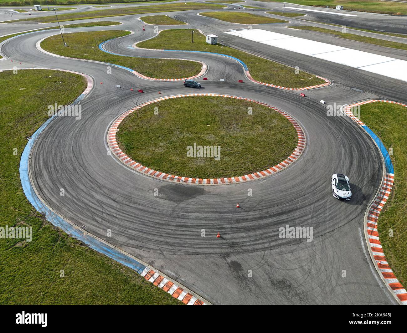 luxury cars racing track. Aerial photograph from drone Stock Photo - Alamy