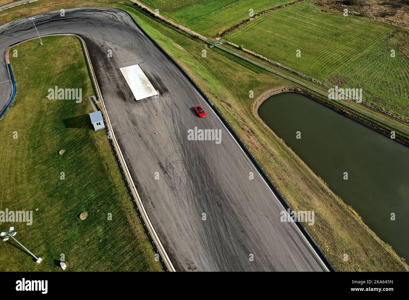 luxury cars racing track. Aerial photograph from drone Stock Photo - Alamy