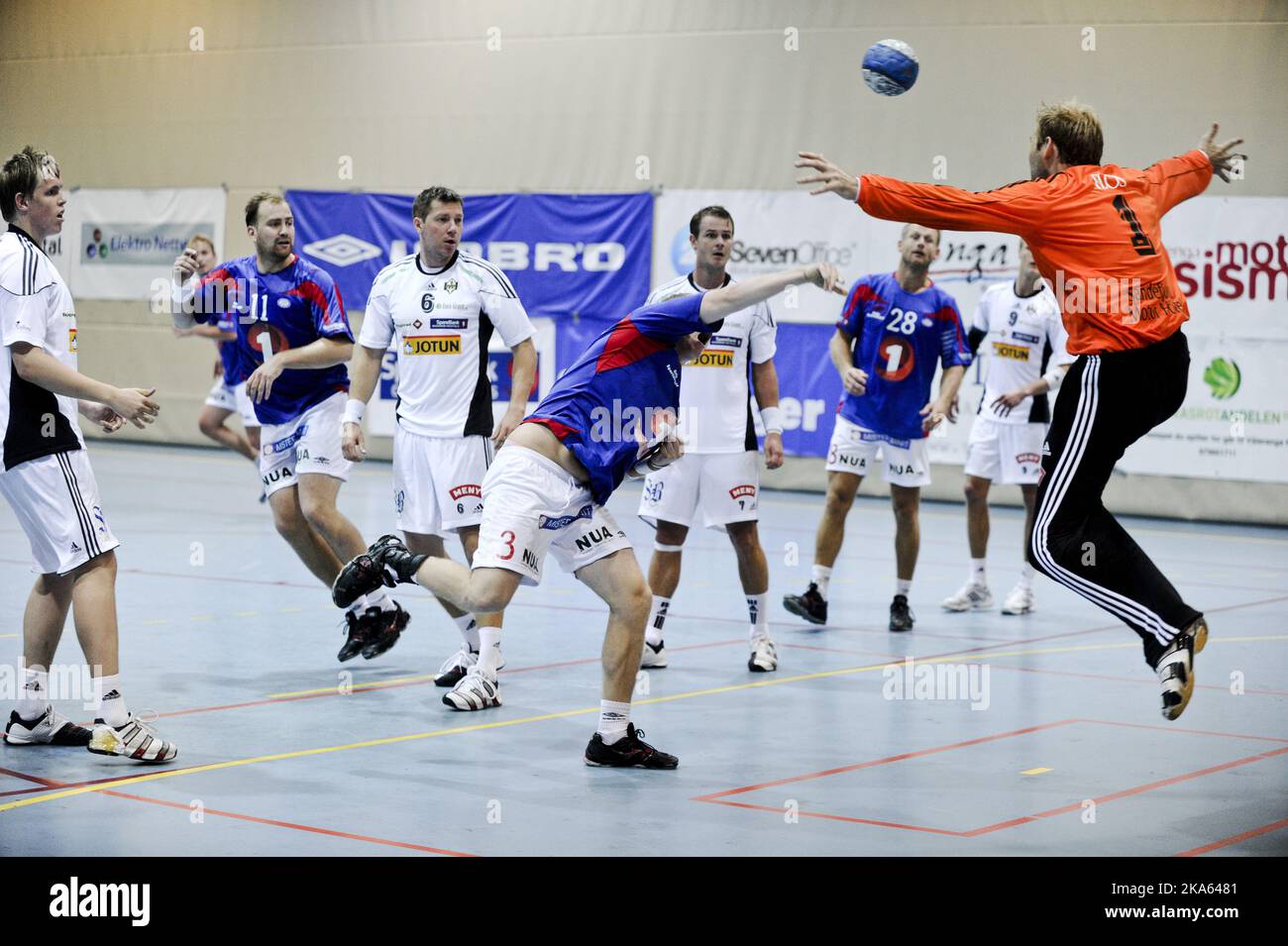 Valerenga's Simen Lereim (no.3) scores past Runar's keeper Simen Hansen ...