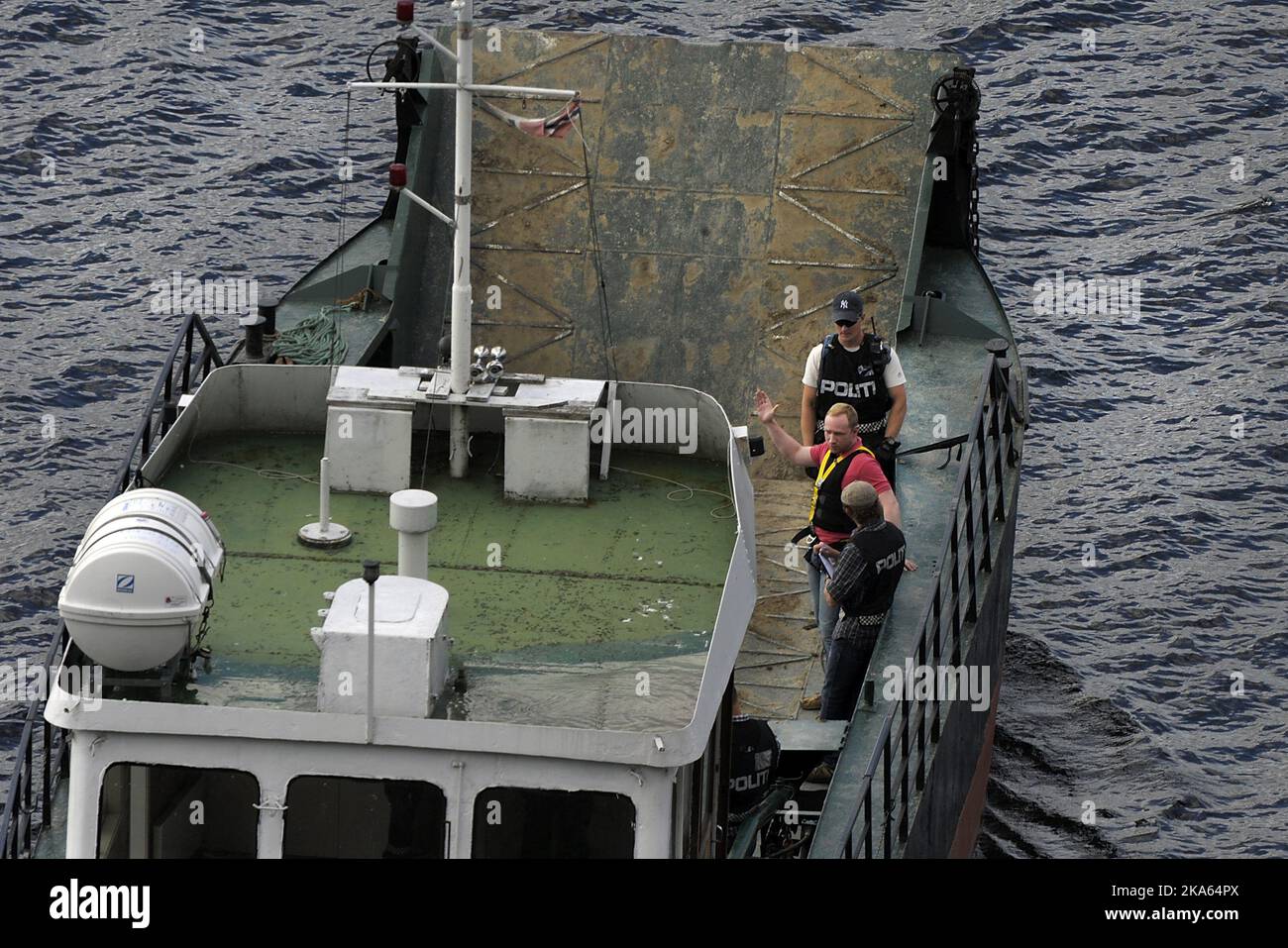Utoya 2011-08-13. Under heavily armoured police guard Anders Behring ...