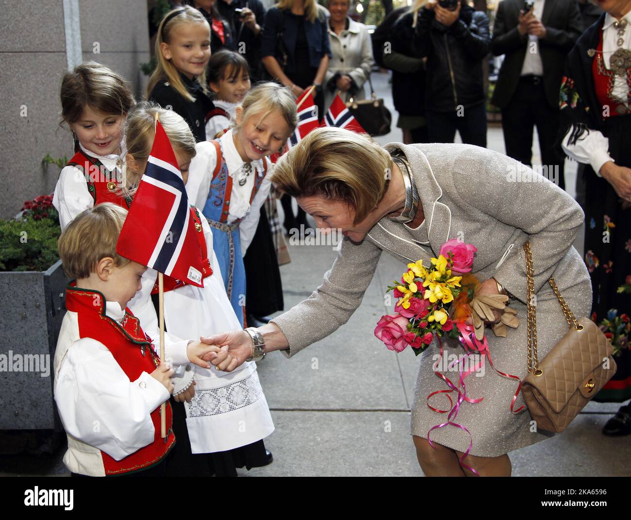 Norwegian Queen Sonja was greeted by children in traditional Norwegian ...