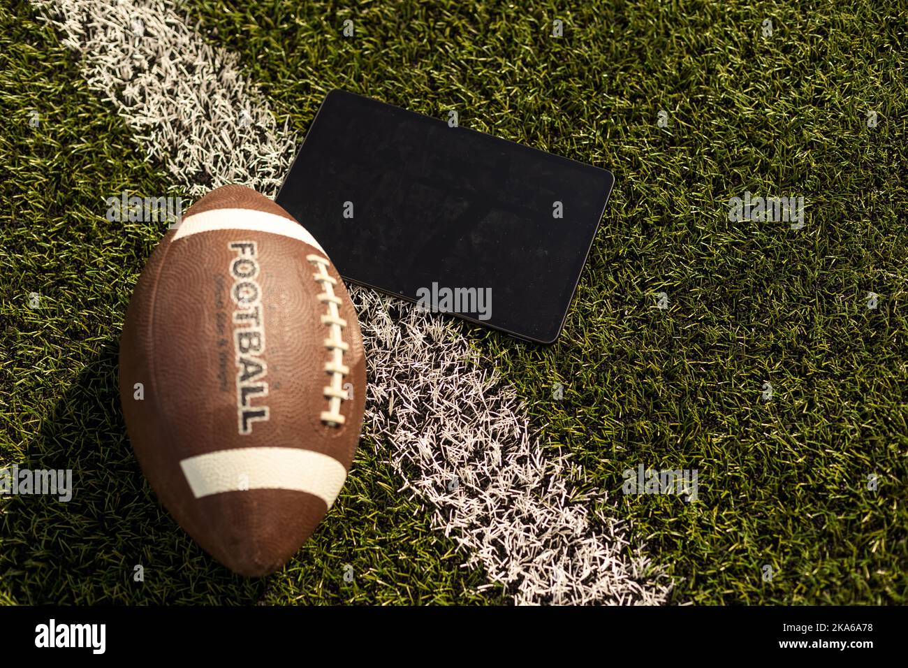 Football player holding money hi-res stock photography and images - Alamy