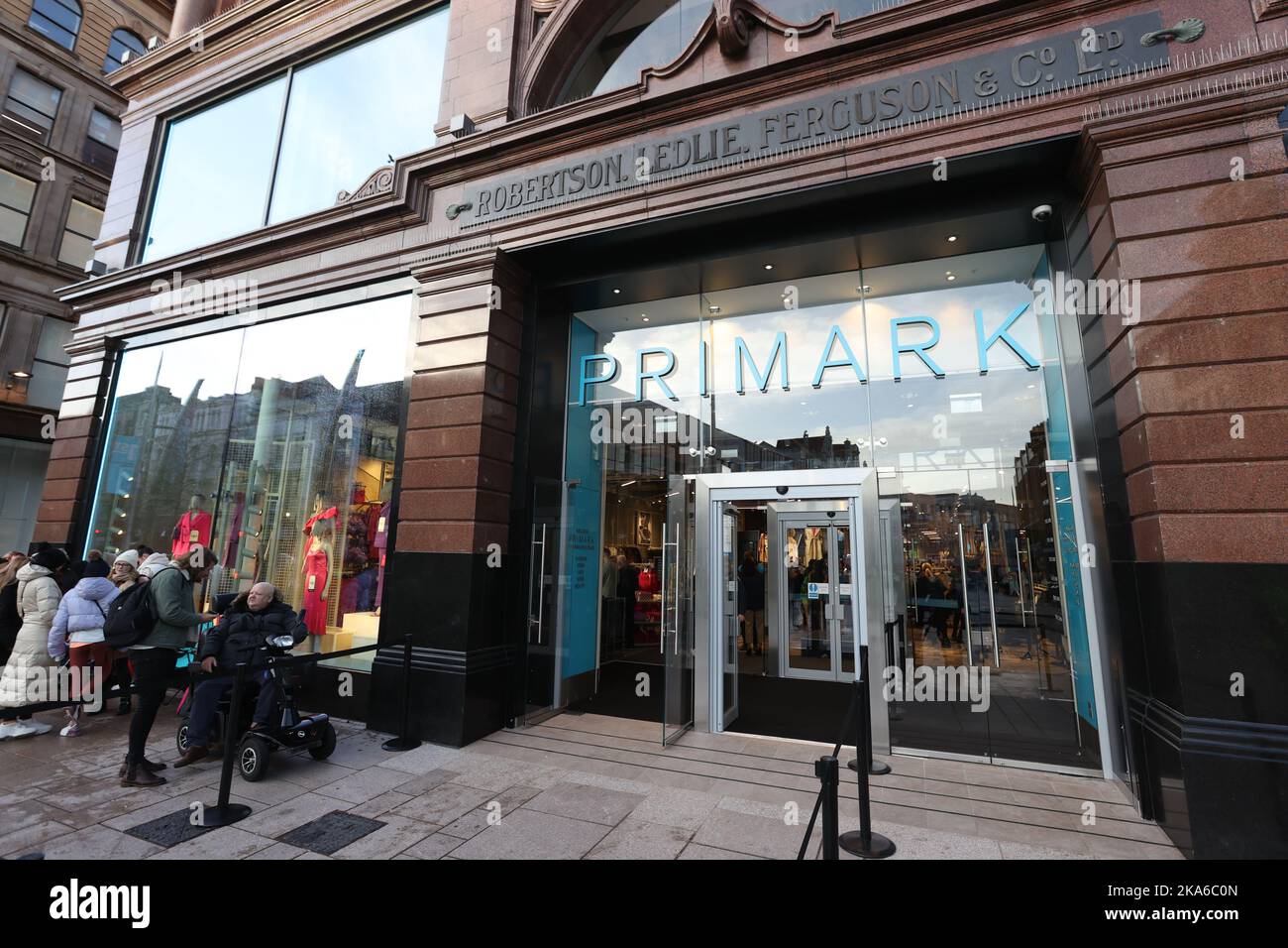 People queuing outside the Primark store in the historic five-storey ...