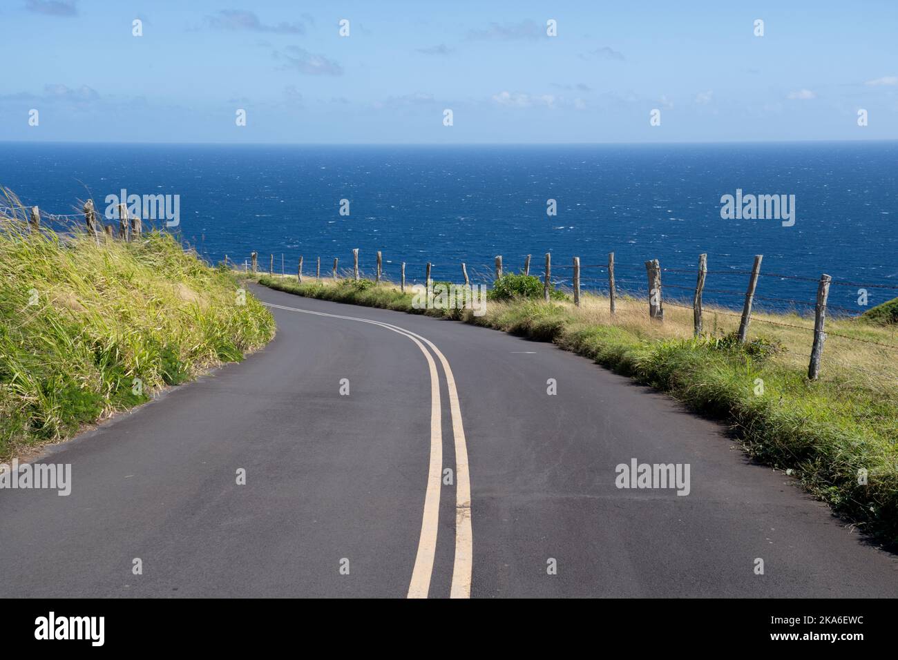 Road trip on empty street West Maui Mountains Hawaii USA Stock Photo ...