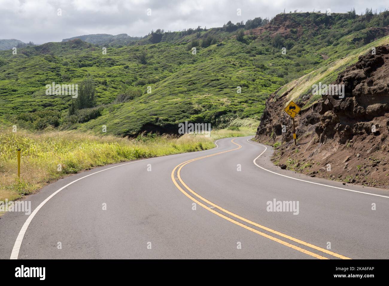 Road trip on empty street West Maui Mountains Hawaii USA Stock Photo ...