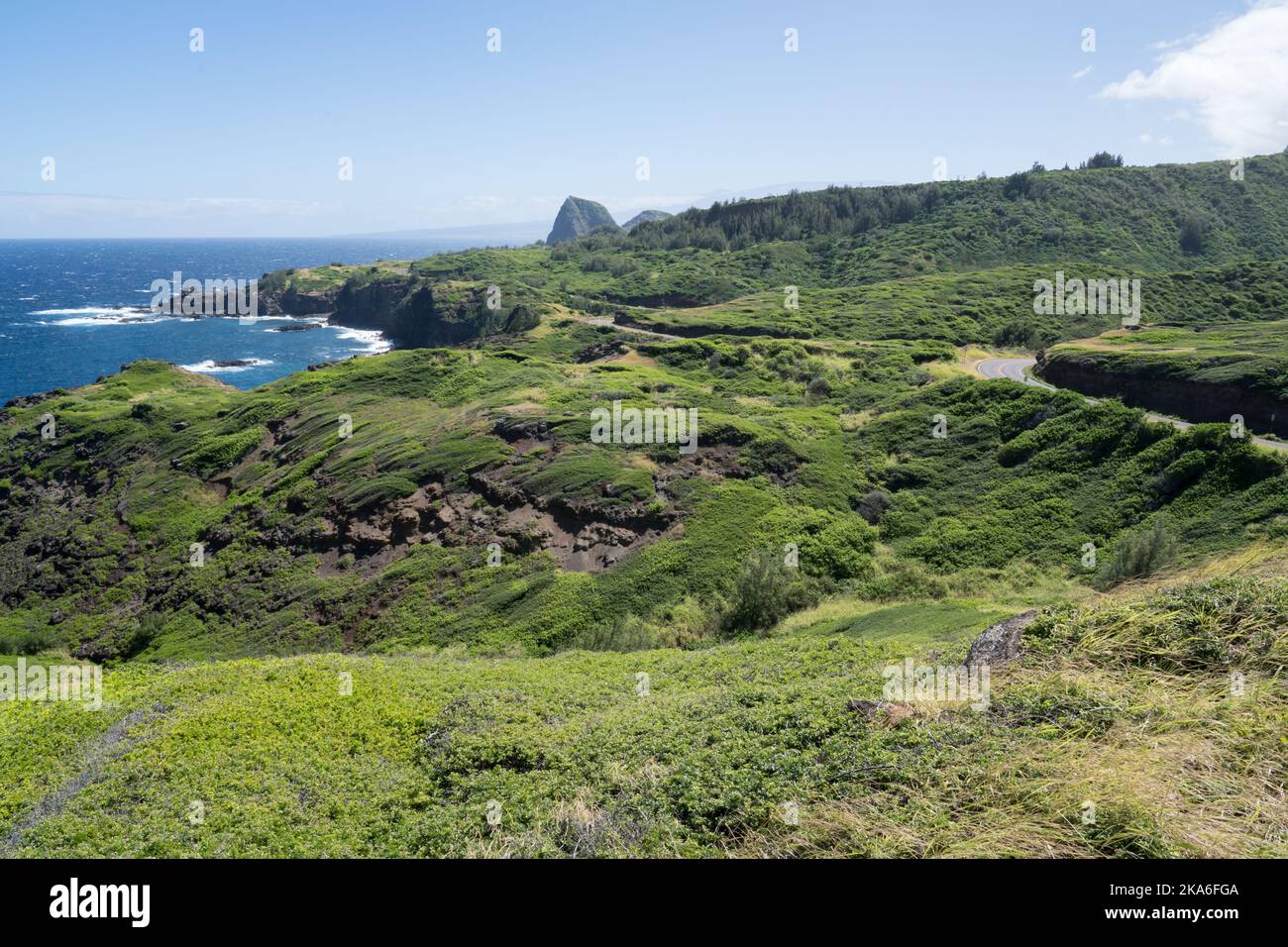 Road trip on empty street West Maui Mountains Hawaii USA Stock Photo ...
