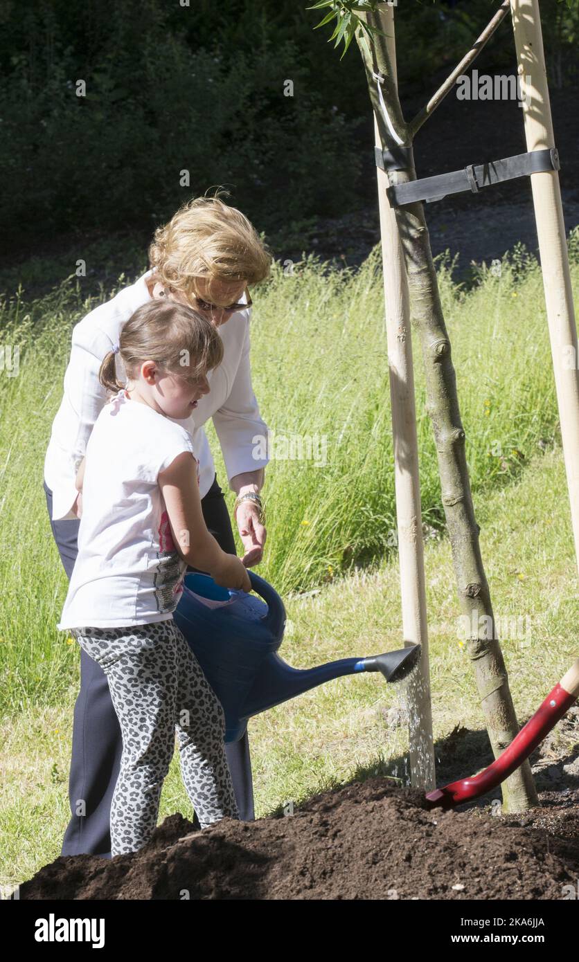 OSLO, Norway 20160613. Queen Sonja helps her grandaughter Emma Tallulah ...