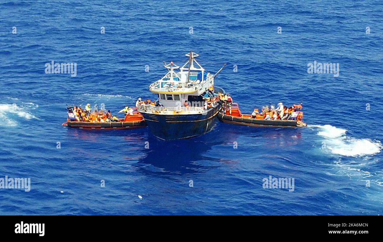 Pilot rescued 176 people from a fishing boat yesterday Stock Photo - Alamy