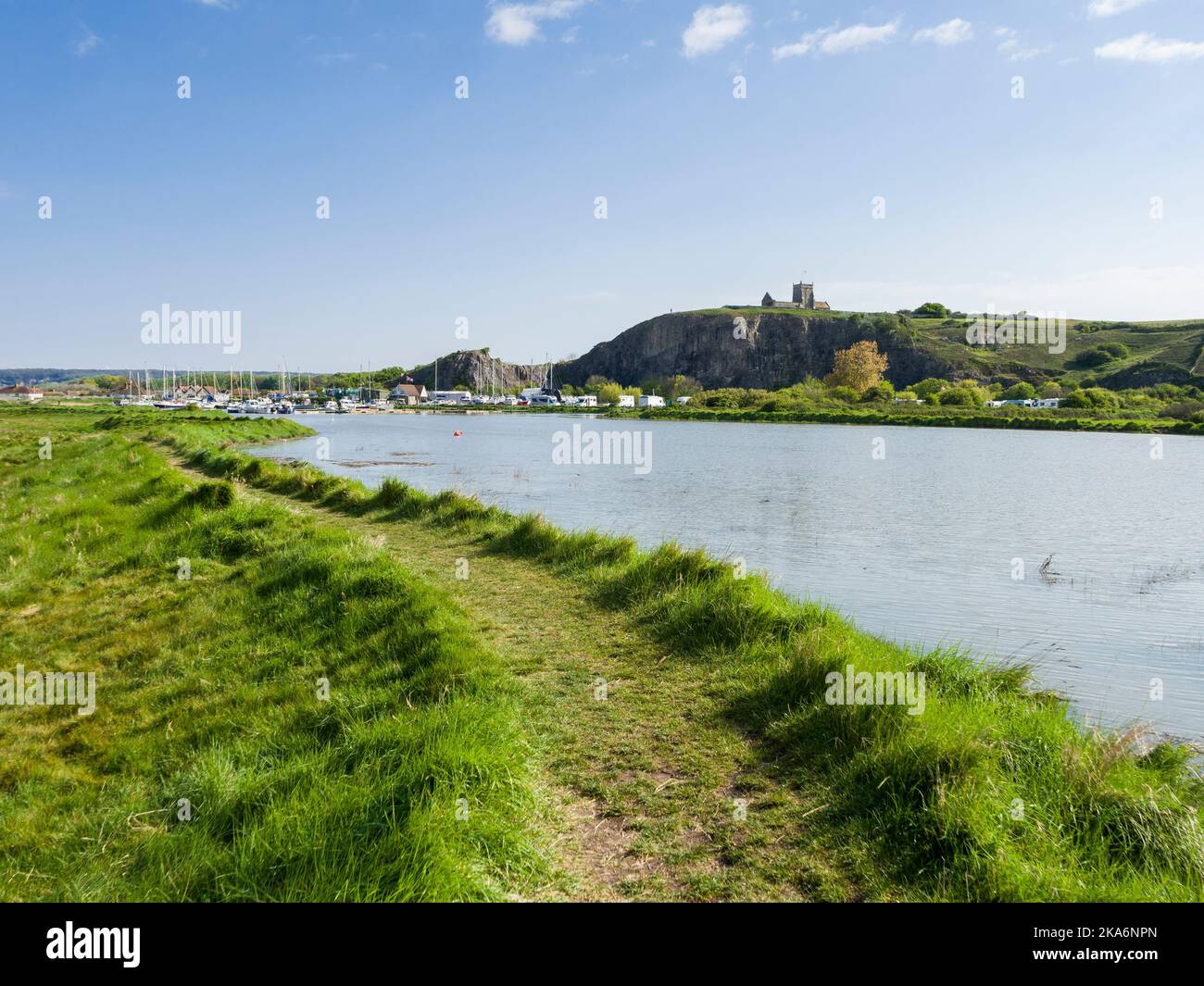 The England Coast Path along the River Axe estuary with Uphill Marina ...