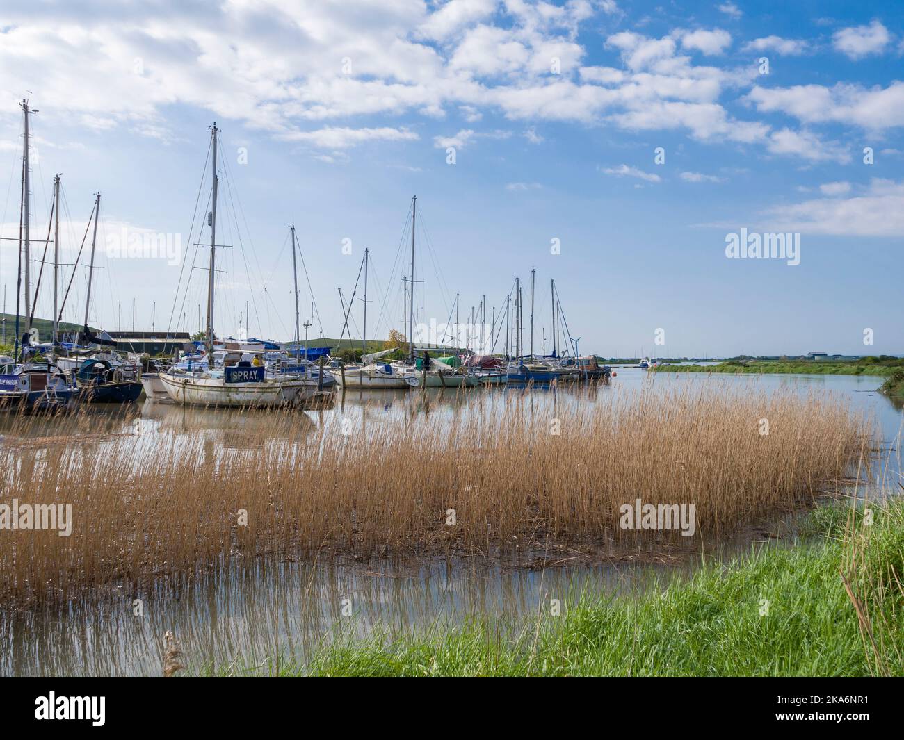 Boats at Uphill Marina beside the River Axe estuary at high tide ...