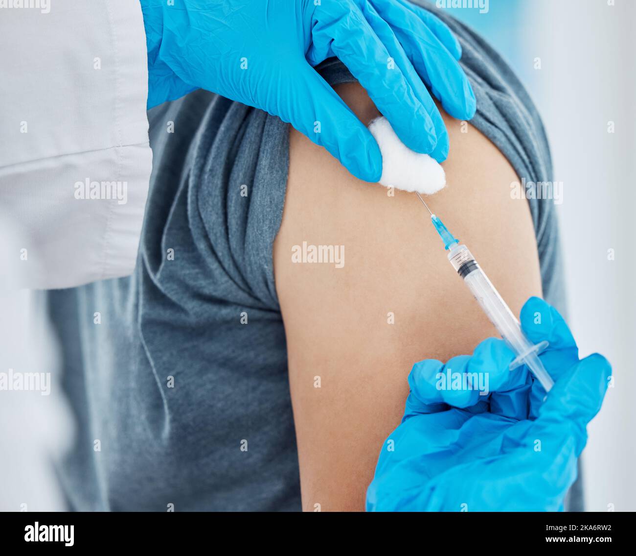 Medicine, needle and patient getting covid vaccine from nurse at ...