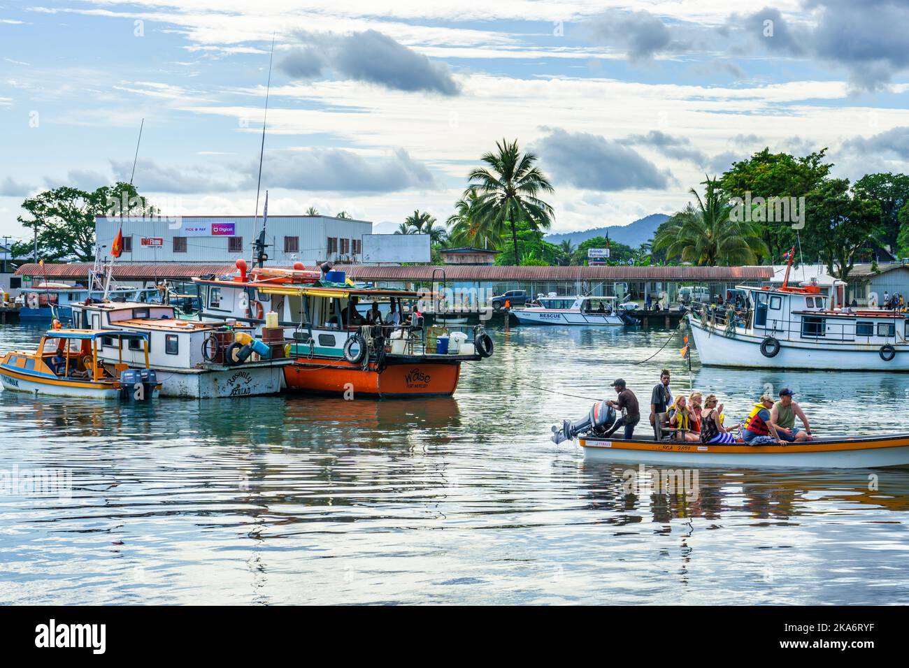 Boats anchored in marina Alotau, Milne Bay Papua New Guinea Stock Photo ...