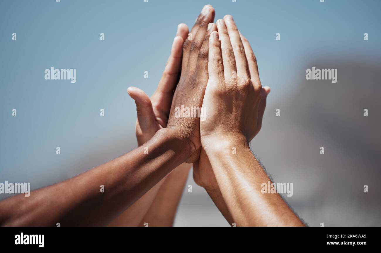 Team sports, diversity and hands doing high five in air for motivation ...