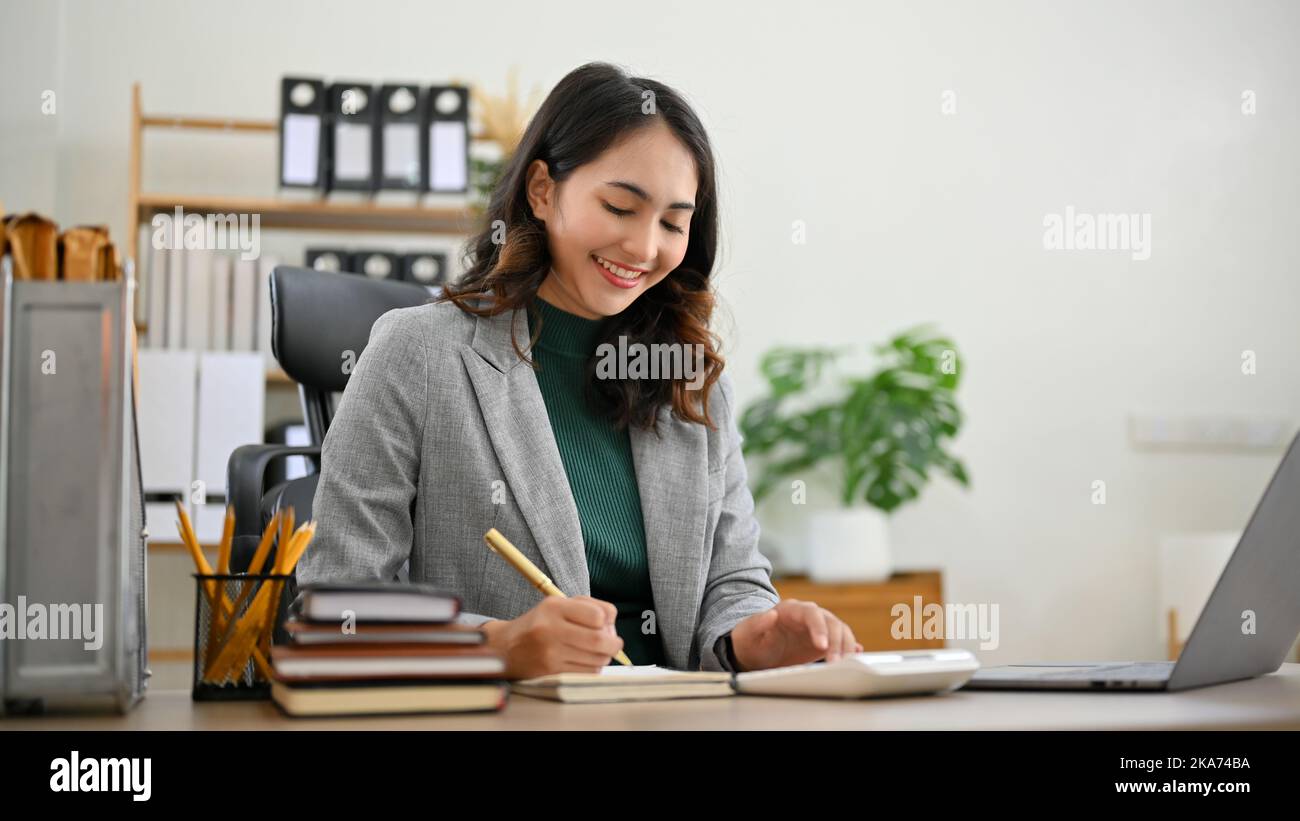 Charming and professional millennial Asian businesswoman or female ...