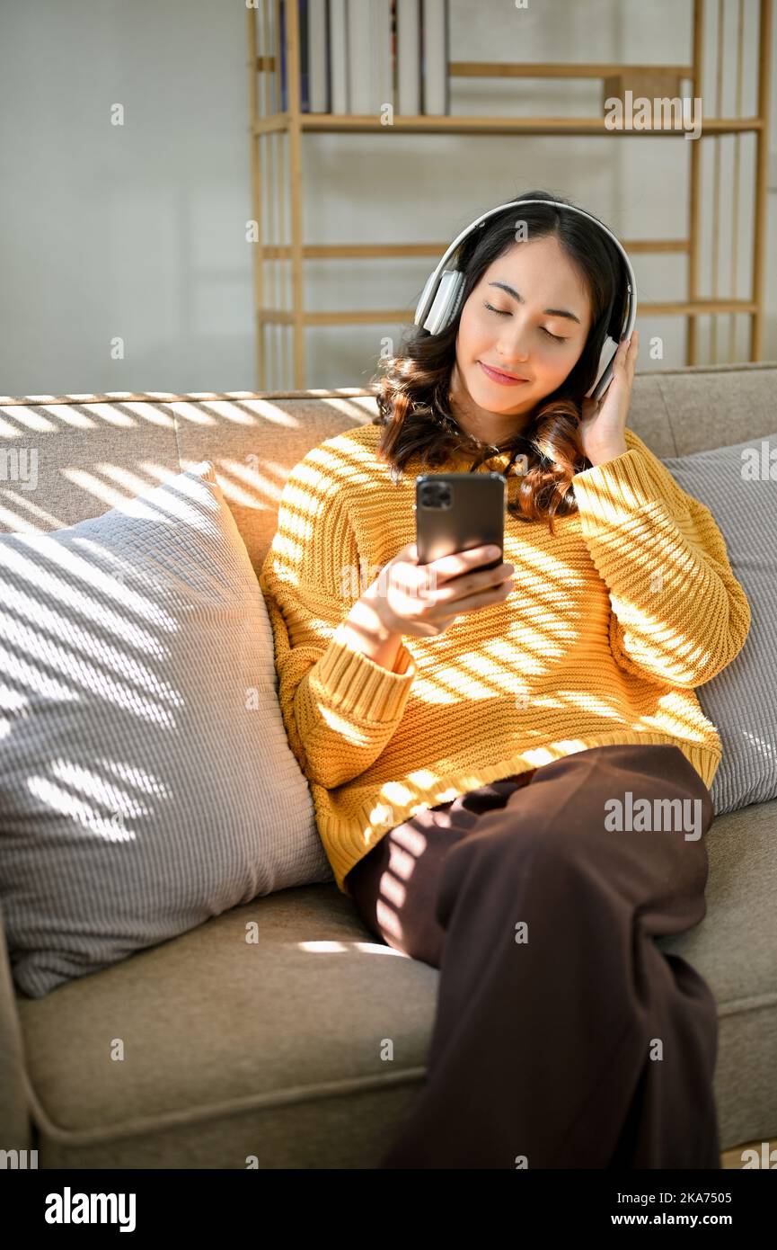Portrait, Relaxed and clam young Asian female in casual clothes ...
