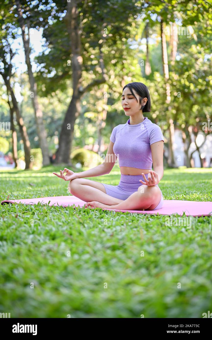 Portrait, Relaxed and clam millennial Asian female in sportswear ...