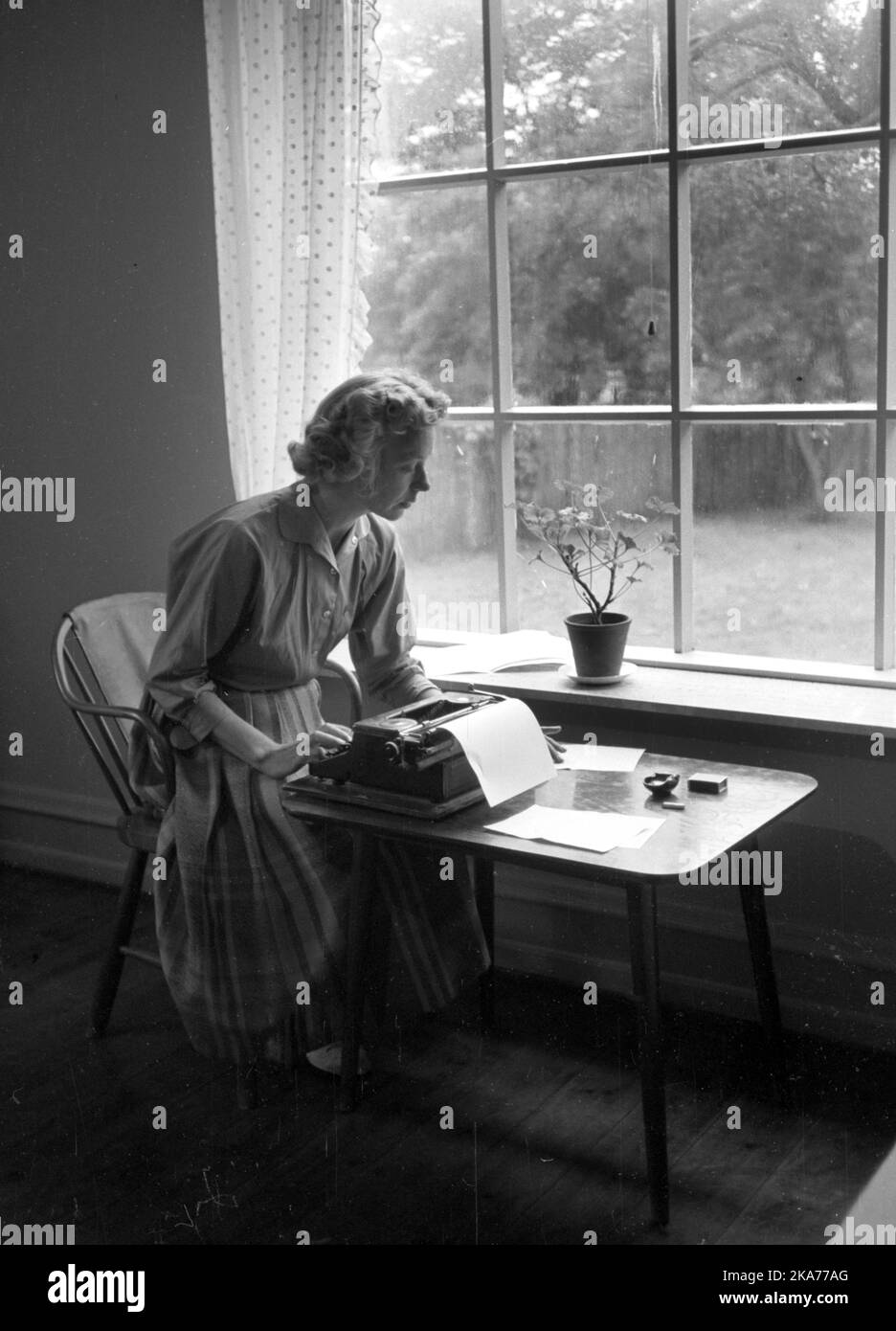 The Danish author Tove Ditlevsen ( 1917 -1976 ) with her typewrtiter at ...