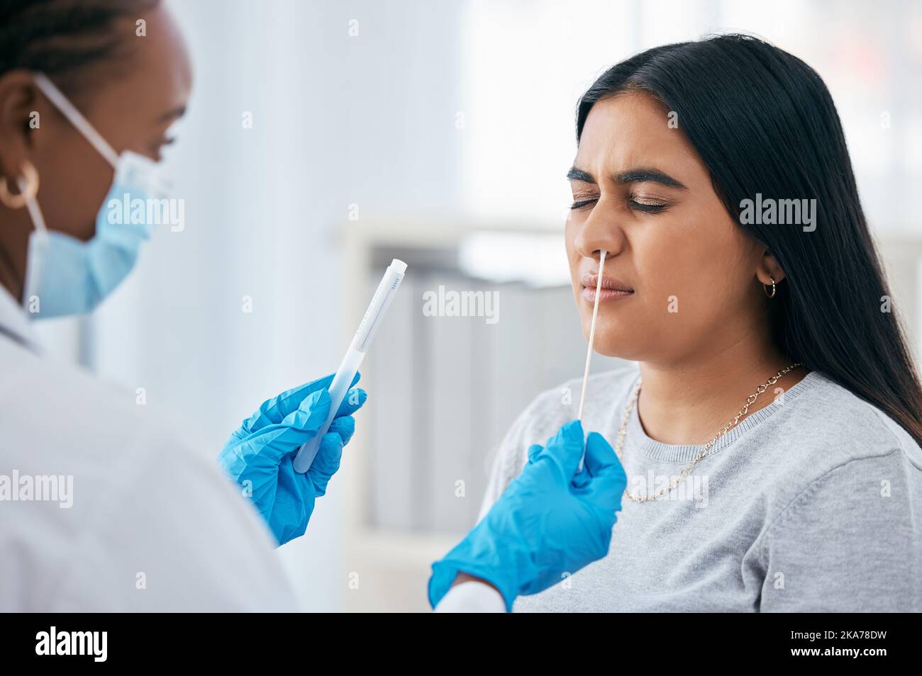 Healthcare, covid, and test with doctor and patient in consultation ...