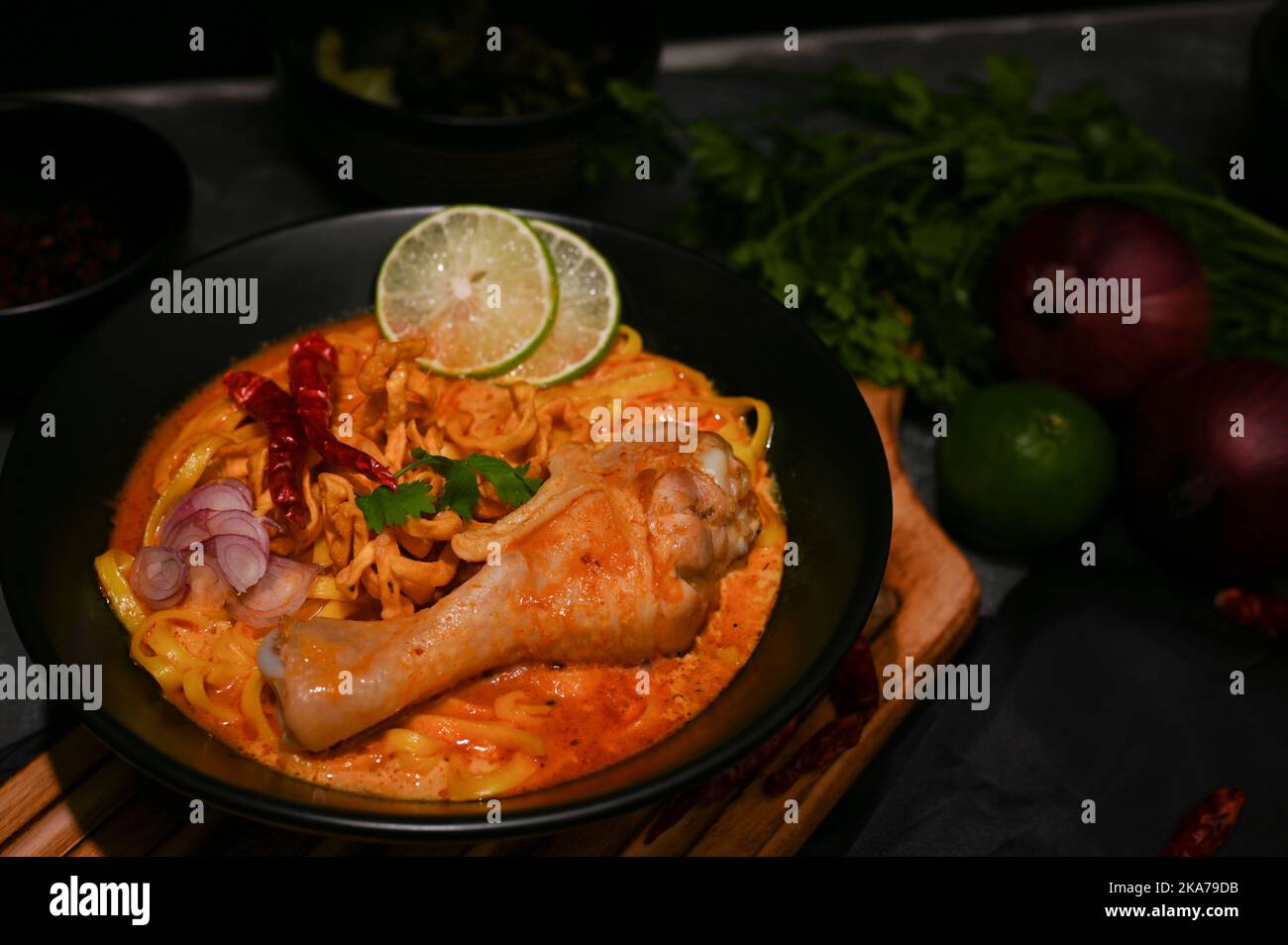 Creamy and slightly spicy yellow curry with chicken drumstick and ...