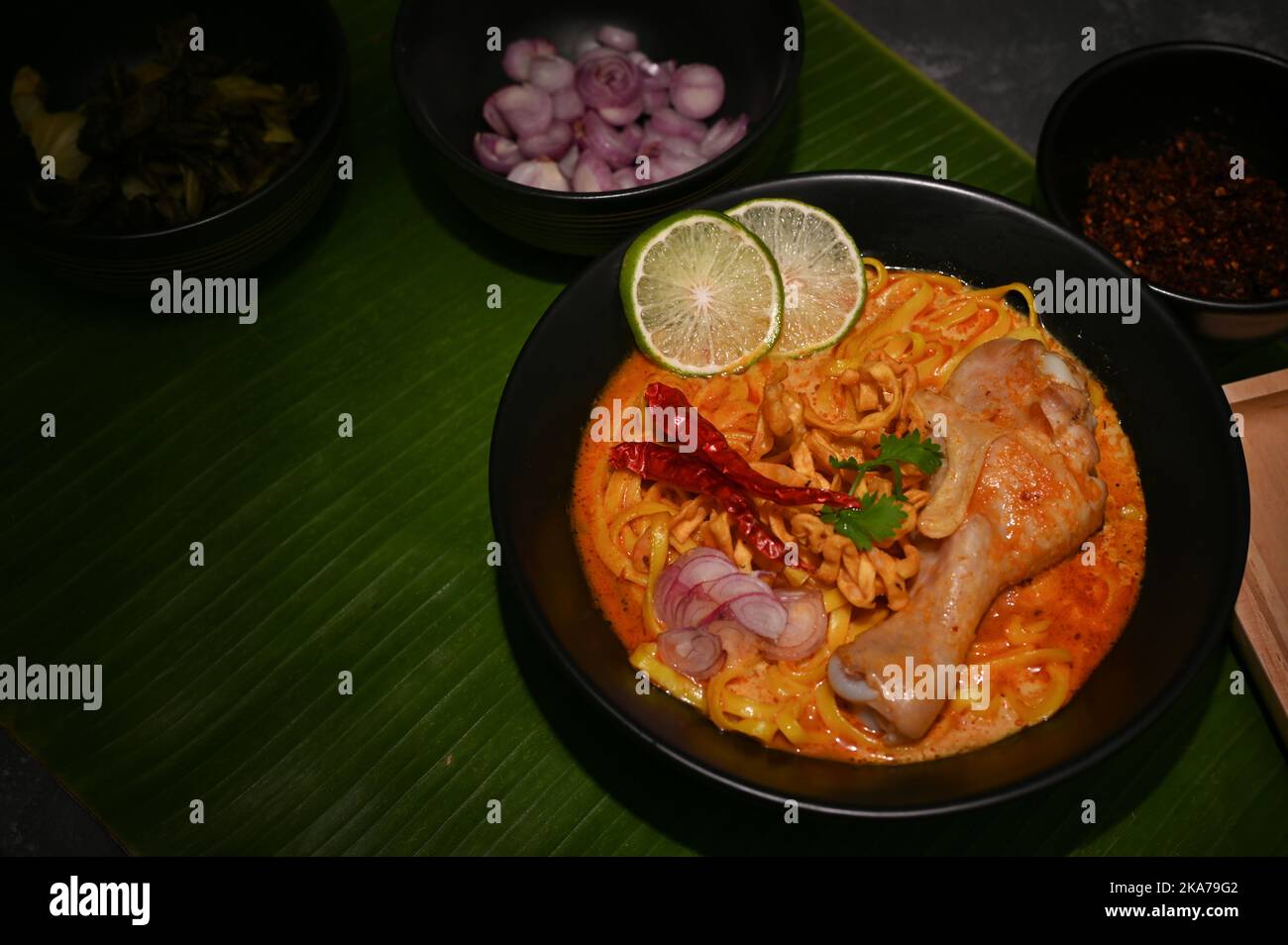 Khao Soi Kai, Noodles curry soup with chicken drumstick, egg noodles ...