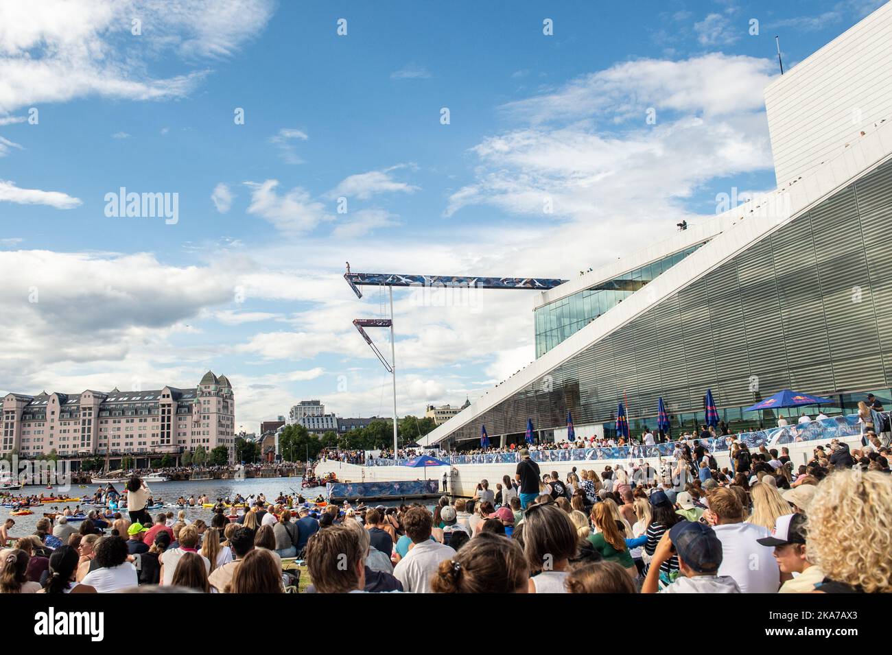 Oslo 20210814. Lots of spectators at the Opera Beach during the cliff ...