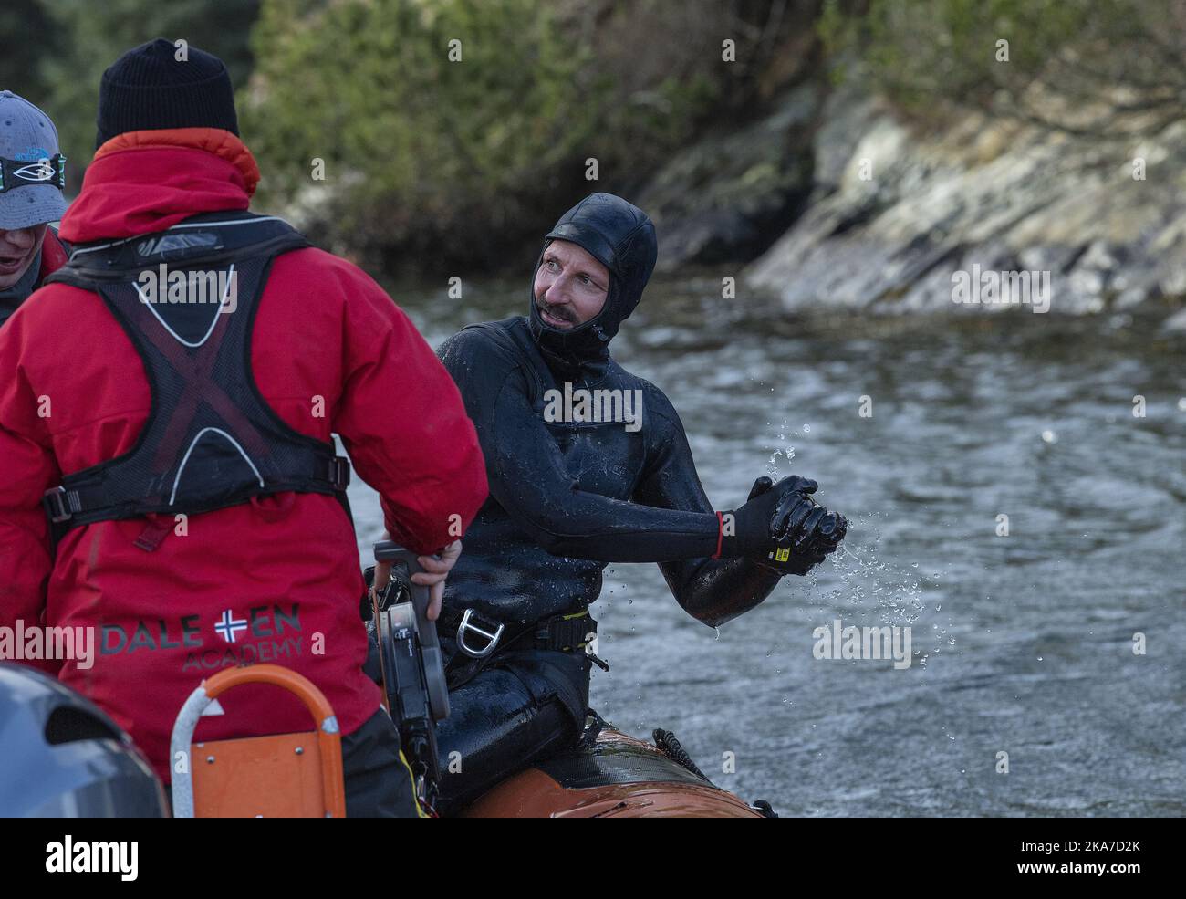 Ã˜ygarden 20220209. Crown Prince Haakon of Norway, jumps into the sea ...