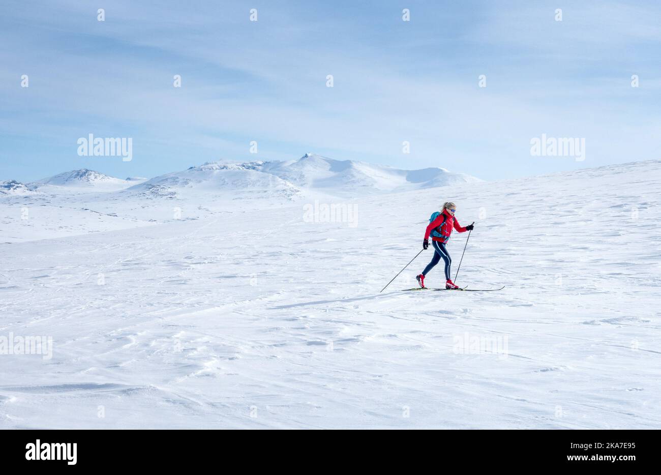 Storlien, Sweden 20220417. Woman skiing in sunny weather at ...