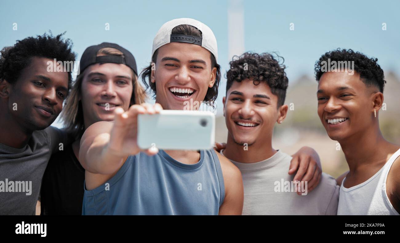Team, phone and friends with smile for selfie in fun sport, exercise or ...