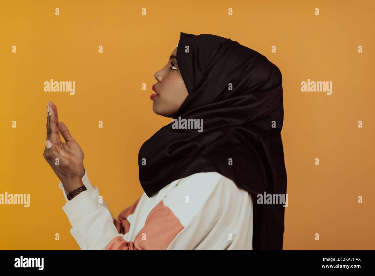 African muslim woman wearing hijab and traditional muslim clothes ...