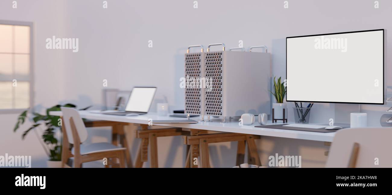 Modern white office workspace in co-working room with PC desktop ...