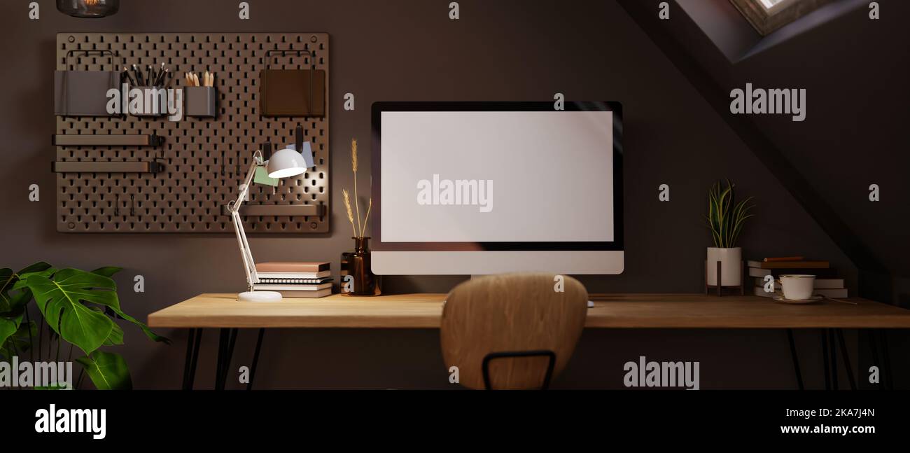 Modern dark home office workspace in attic room interior design with PC ...