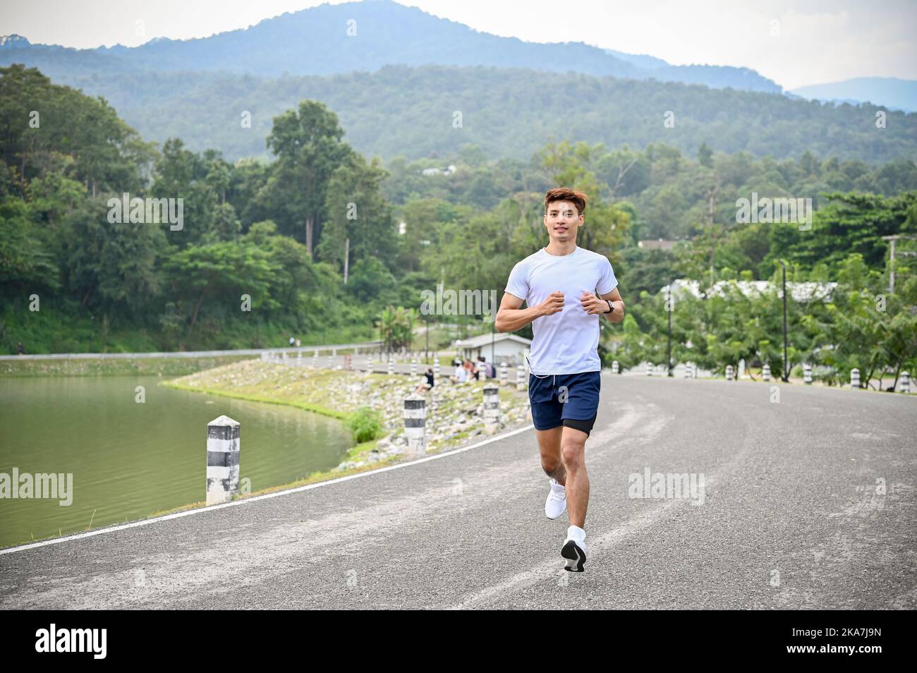 Marathon endurance asian hi-res stock photography and images - Alamy