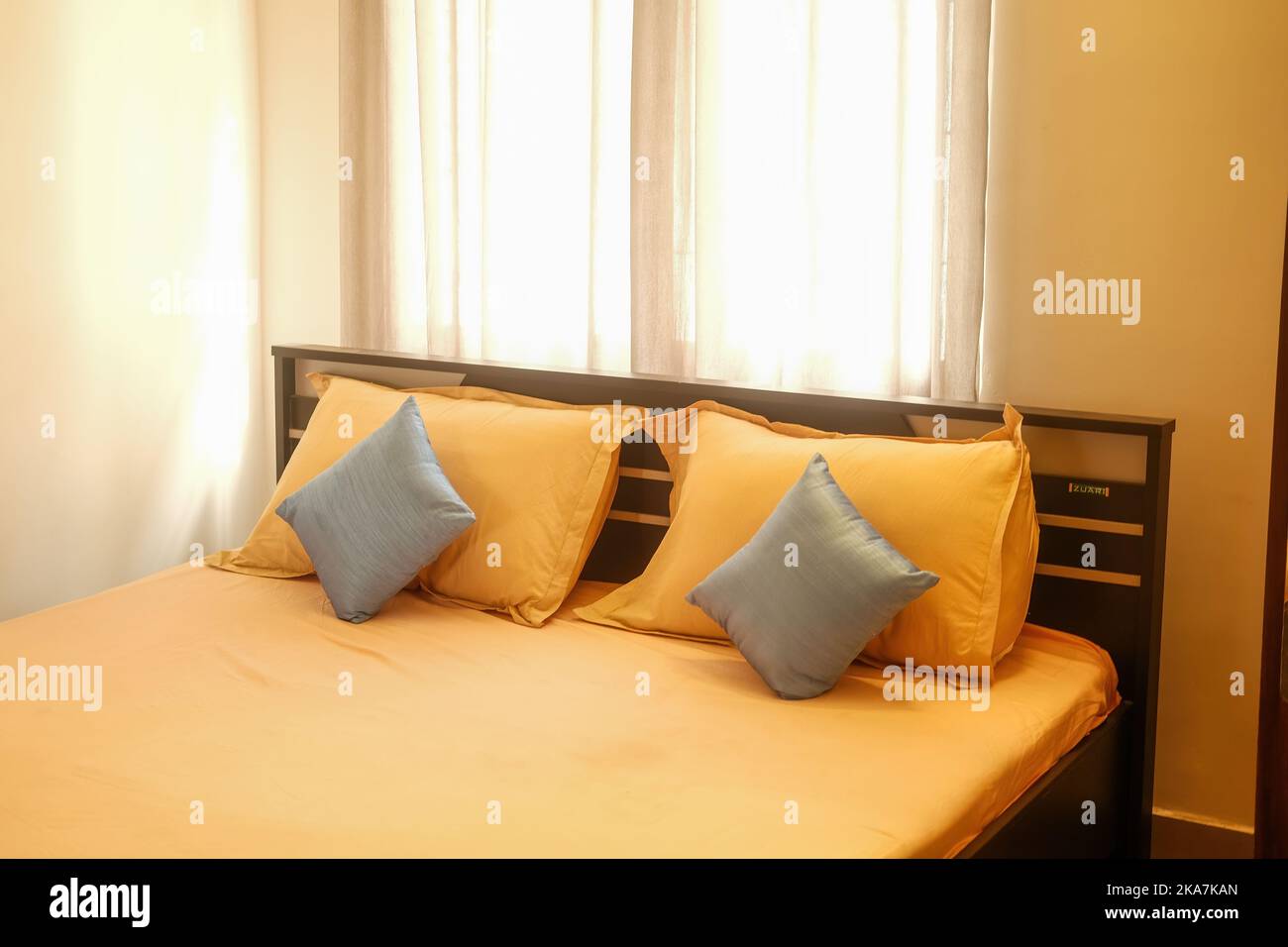 A section shot of a dimly lit hotel room in Guwahati,Assam Stock Photo ...