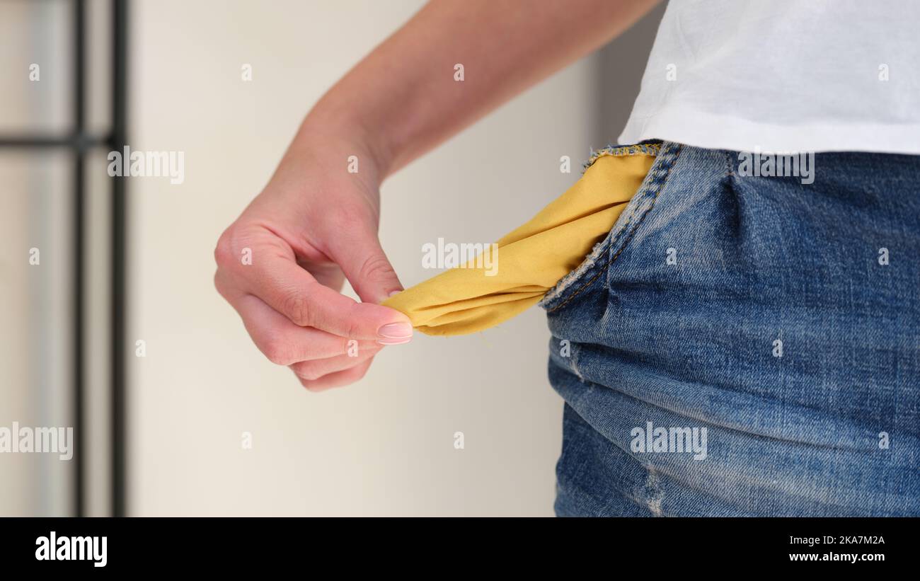 Man turning inside and showing empty pocket Stock Photo - Alamy