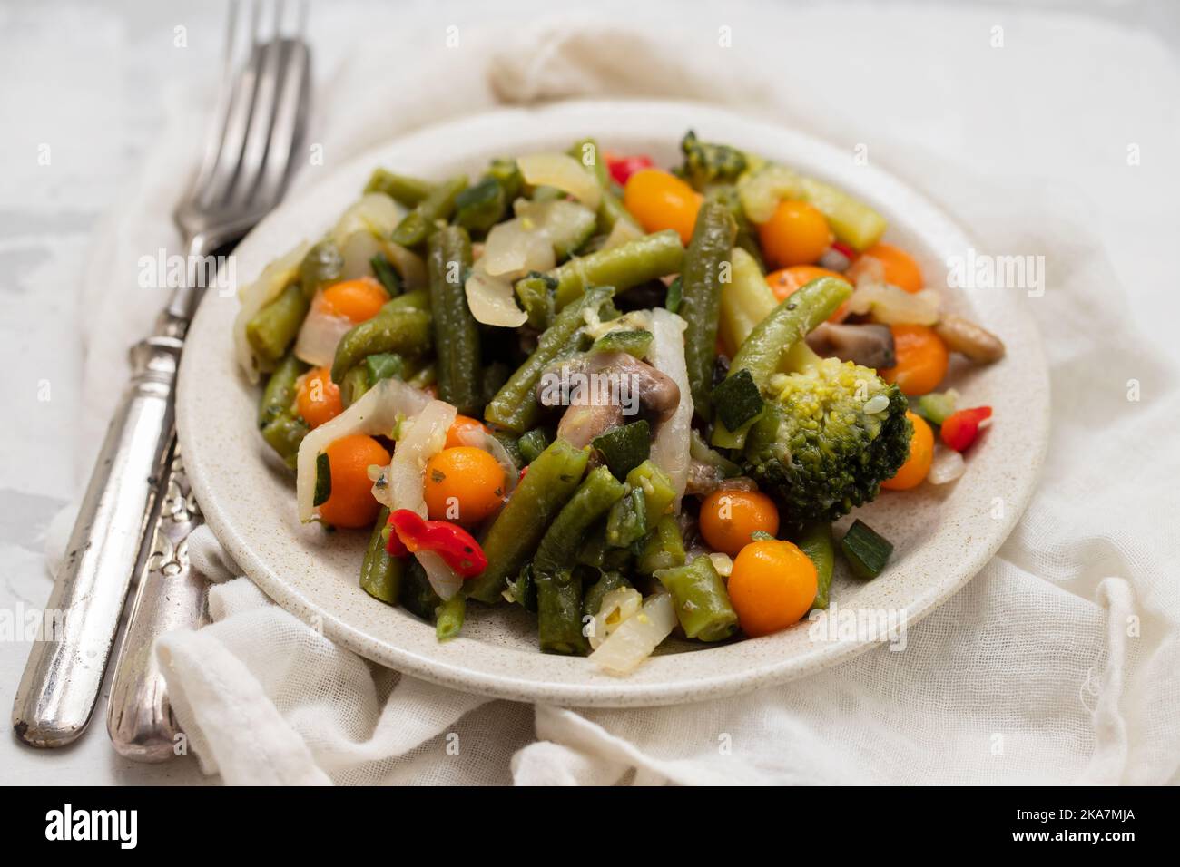 Mixed boiled vegetables on light brown dish Stock Photo - Alamy