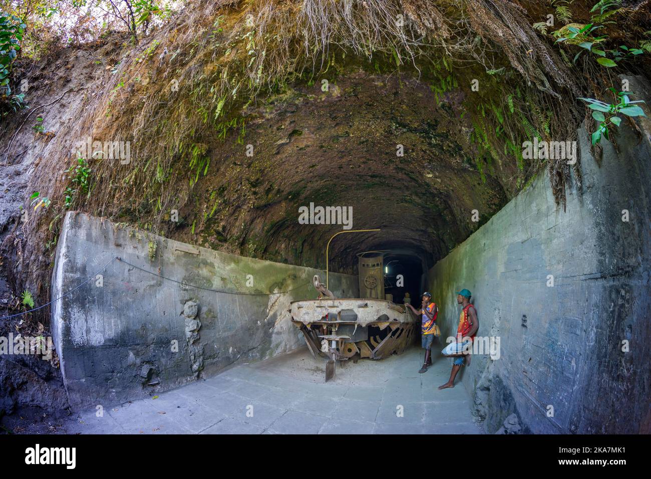 Tourists visiting remains of WWII Japanese transport barge in barge ...