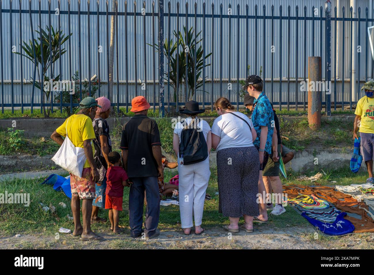 Cruise ship tourists buying goods at open air market on street outside ...