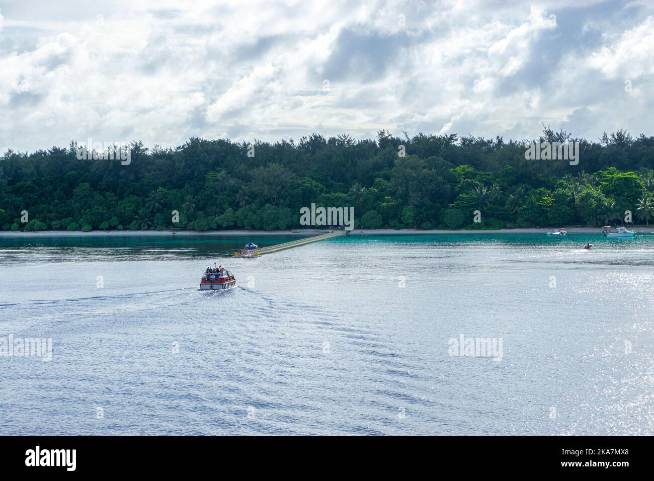 Passengers being transferred to jetty by small tenders from cruise ...