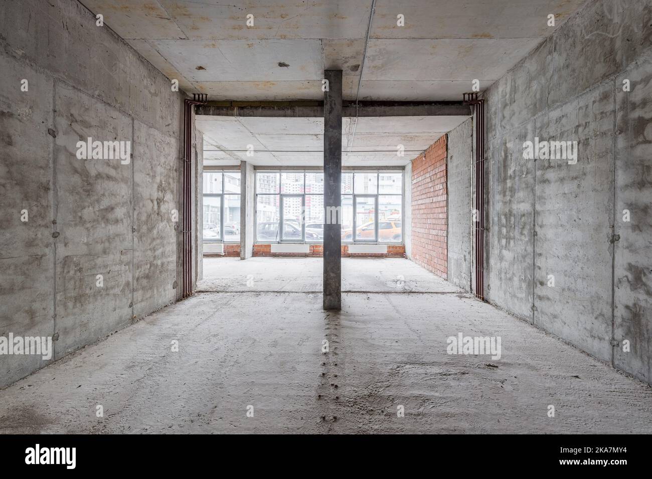 Empty concrete commercial space without finishing with partitions Stock ...