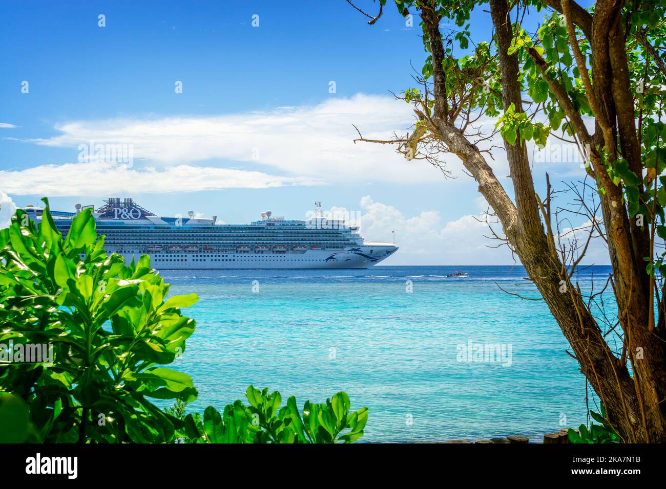 Cruise ship anchored off Conflict Islands, Papua New Guinea Stock Photo ...