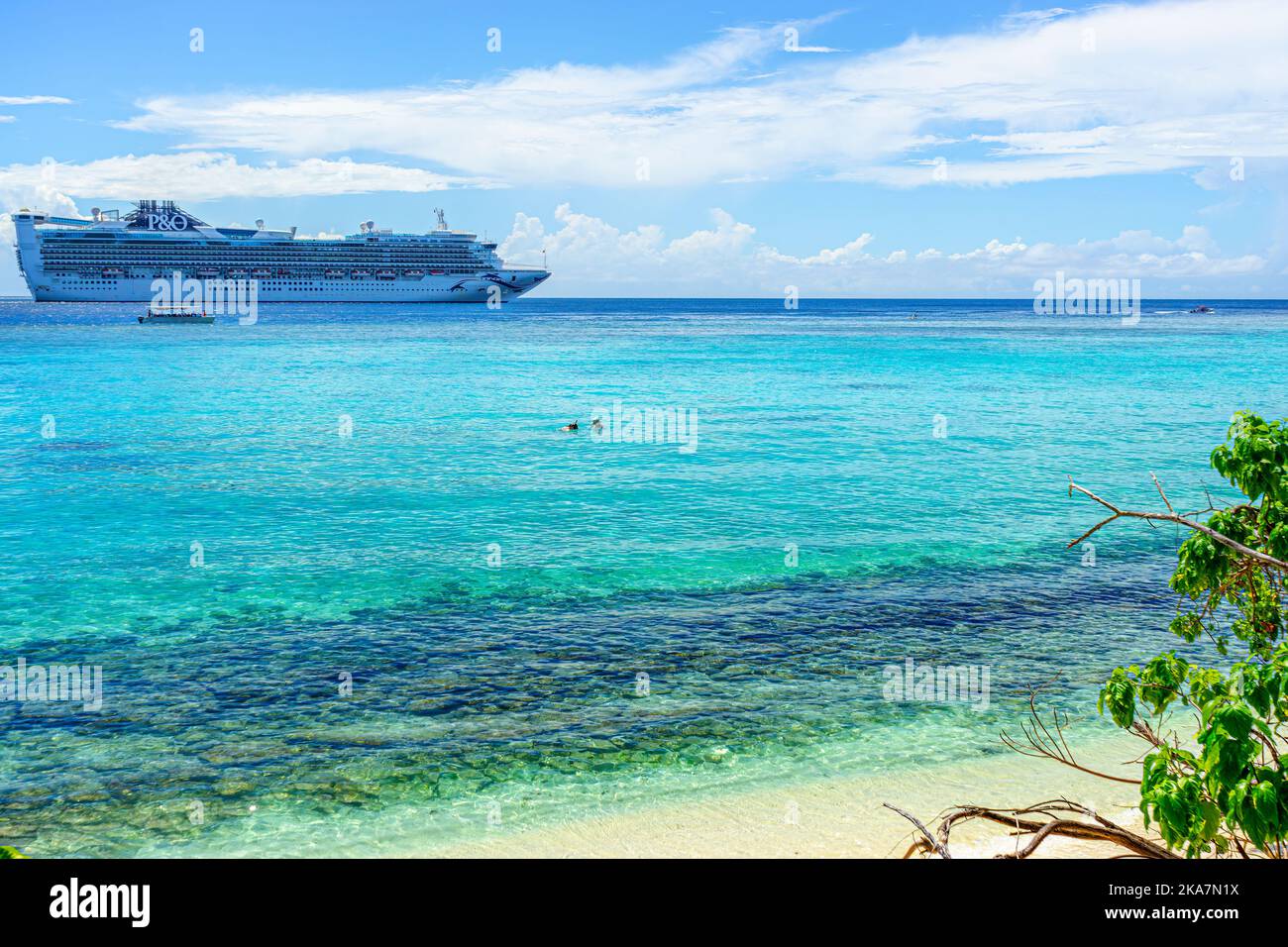 Cruise ship anchored off Conflict Islands, Papua New Guinea Stock Photo ...