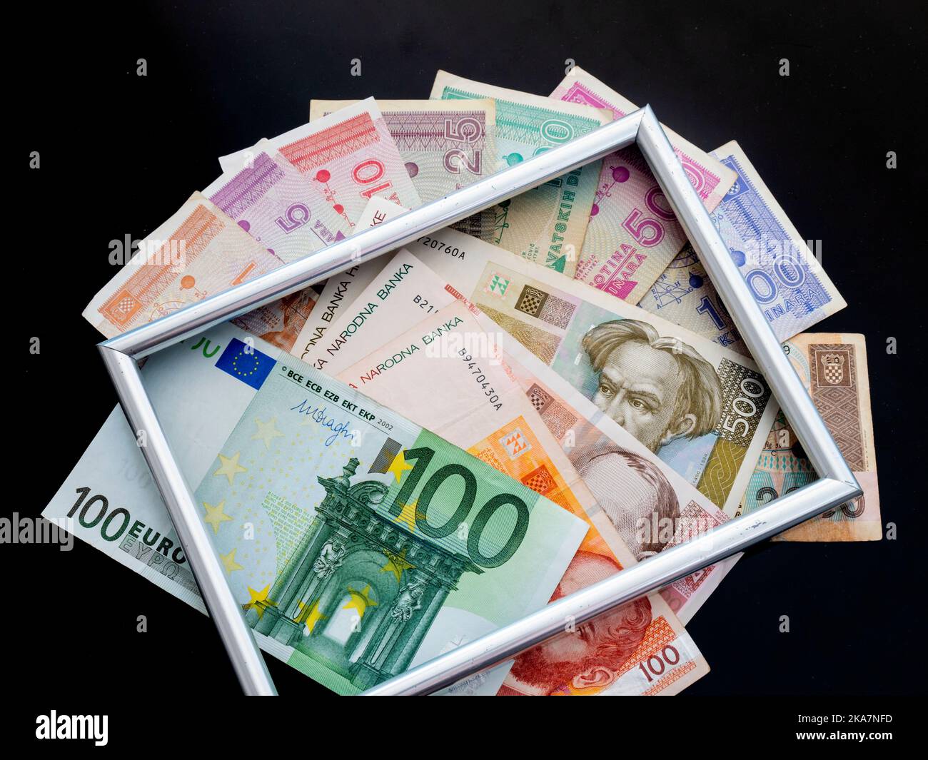 Framed picture frame atop Croat Croatia banknotes of Croatian Dinars ...