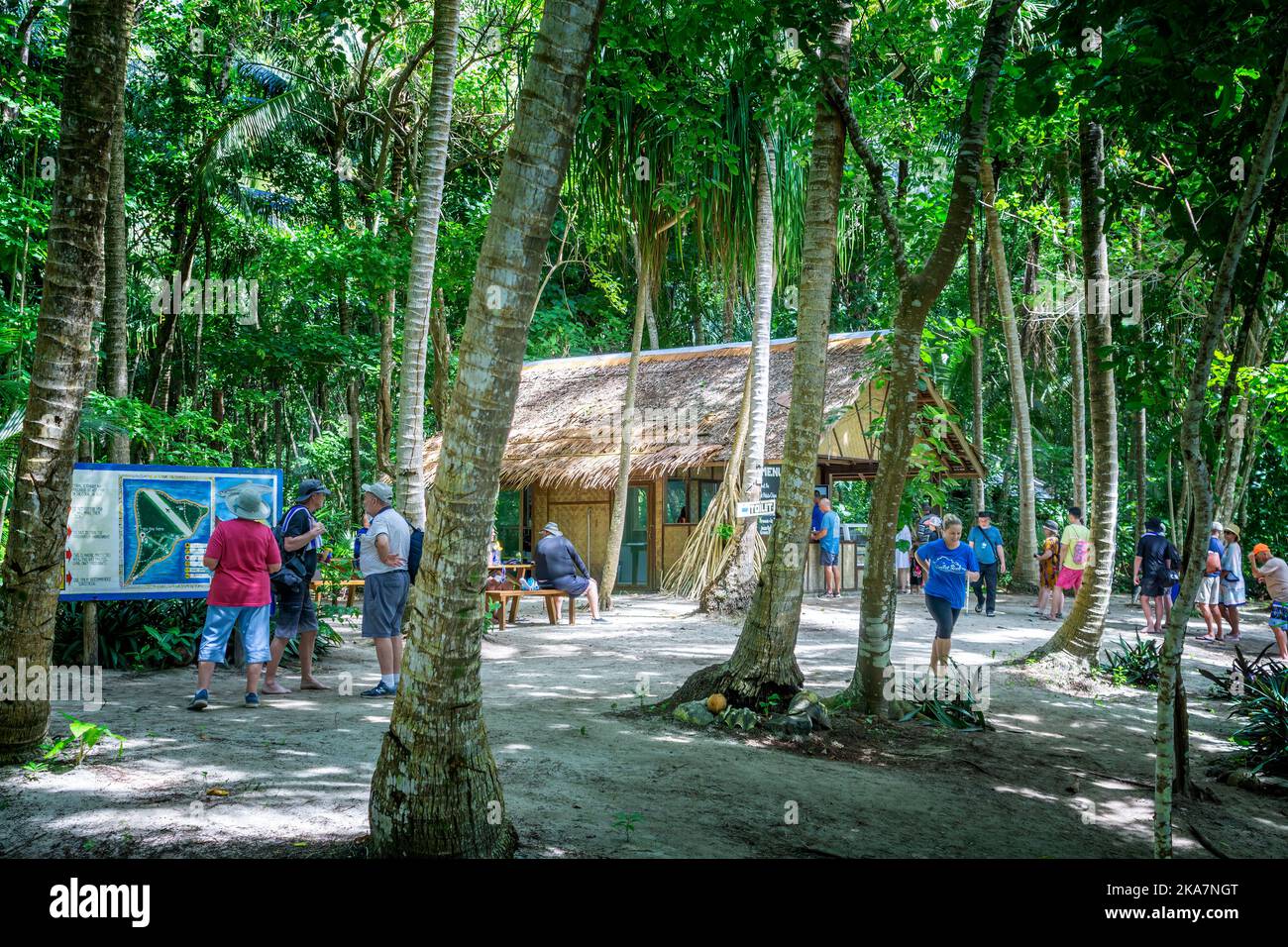 Holidaymakers queueing at beach bar, Conflict Islands, Papua New Guinea ...
