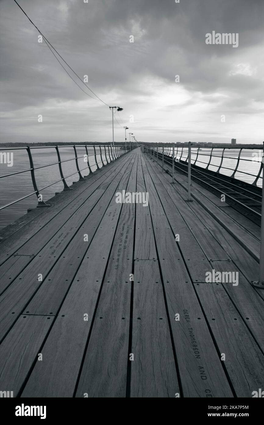 wooden deck of hythe pier hampshire Stock Photo - Alamy