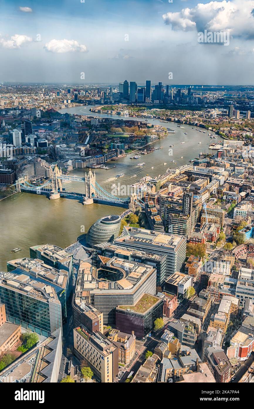 Scenic aerial view of London, over the river Thames towards Canary ...