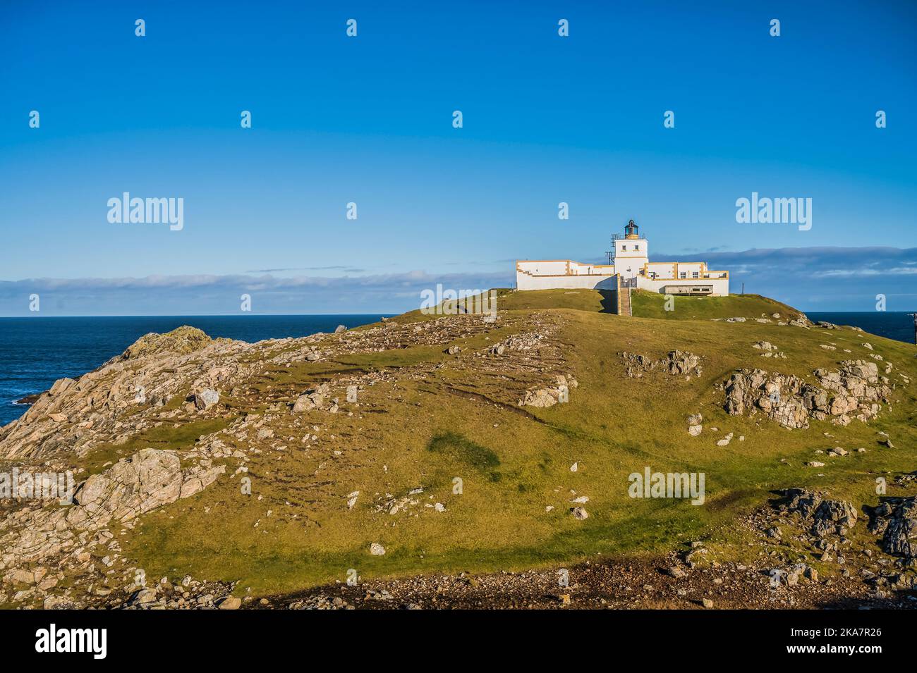 The image is of Strathy Point lighthouse in the far north of the ...