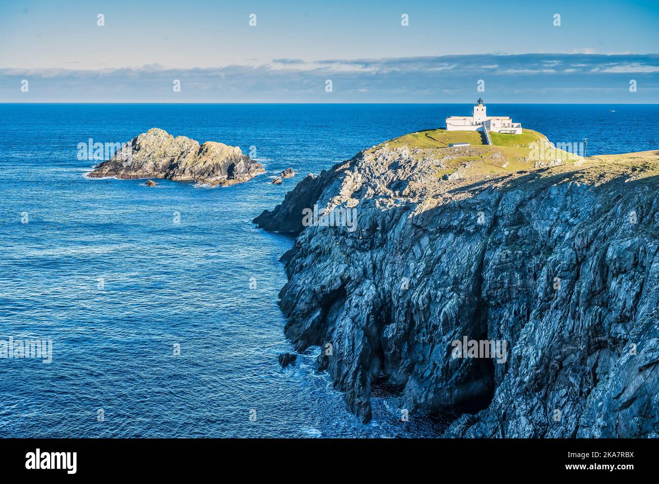 The image is of Strathy Point lighthouse in the far north of the ...