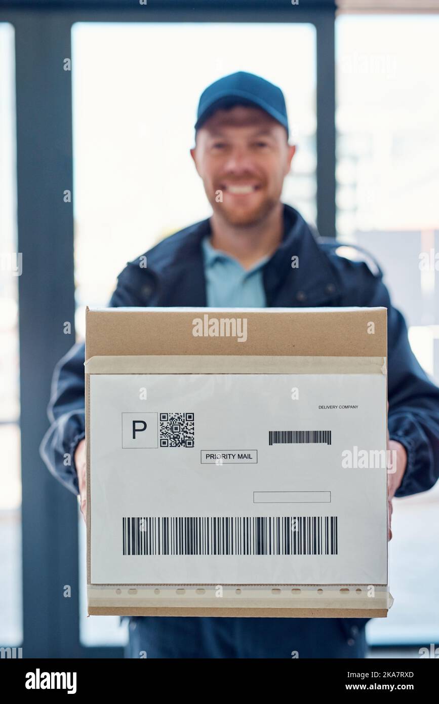 Ive got your package right here. Cropped portrait of a handsome ...